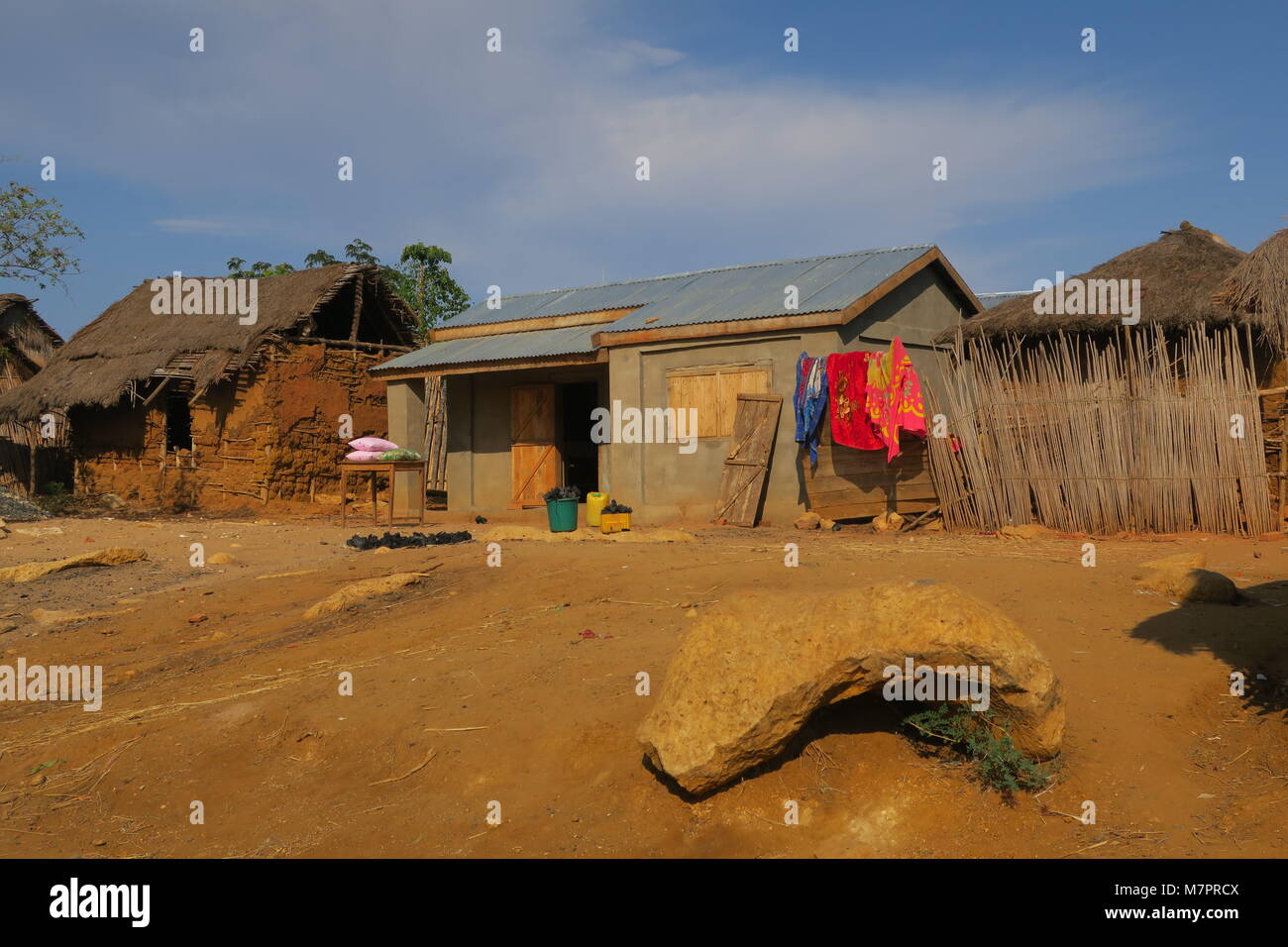 Poverty in Malagasy village. Small simple home on countryside of ...