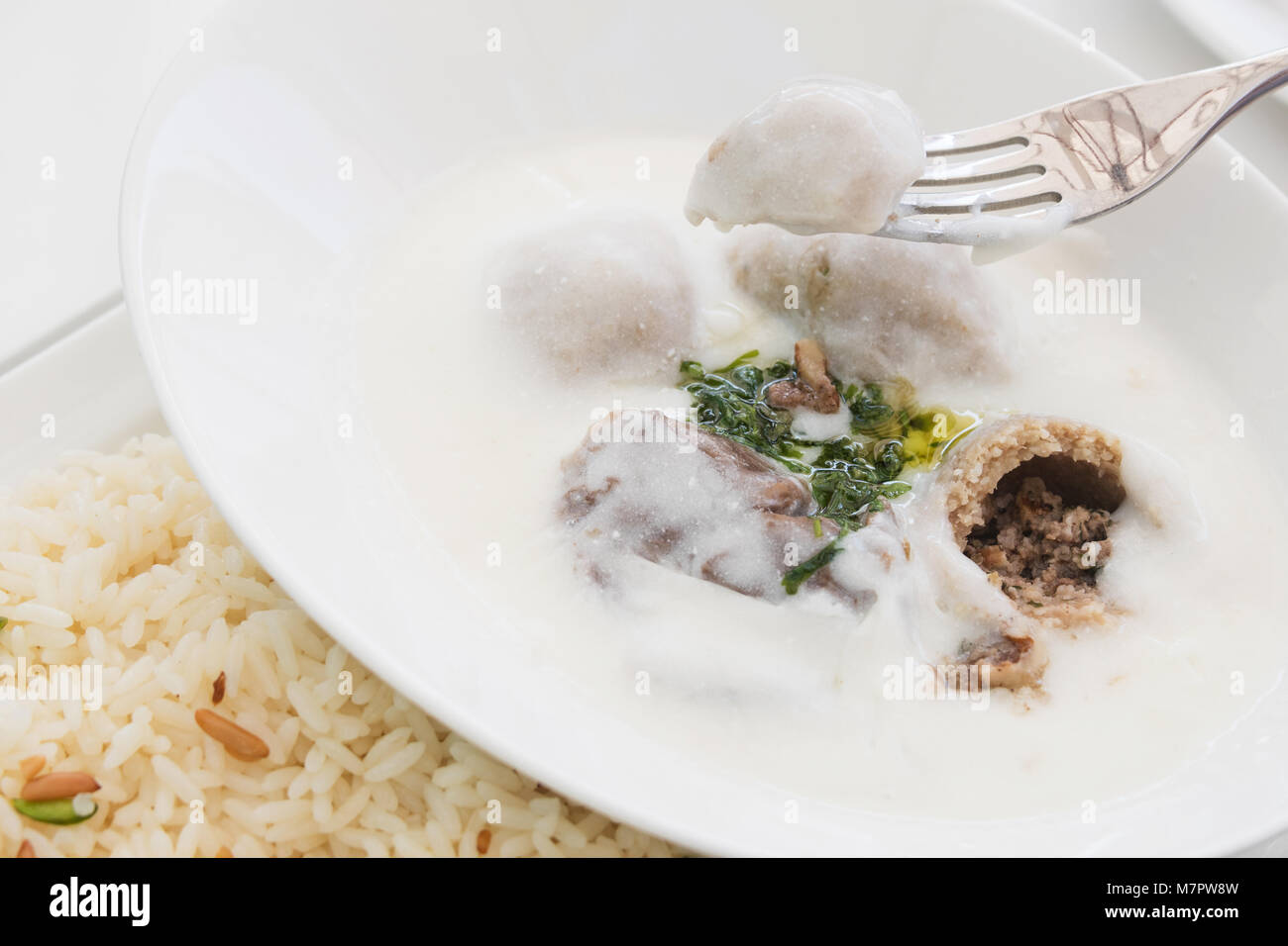 Shakriya - lamb meat in yoghurt sauce, served with white rice and salad ...
