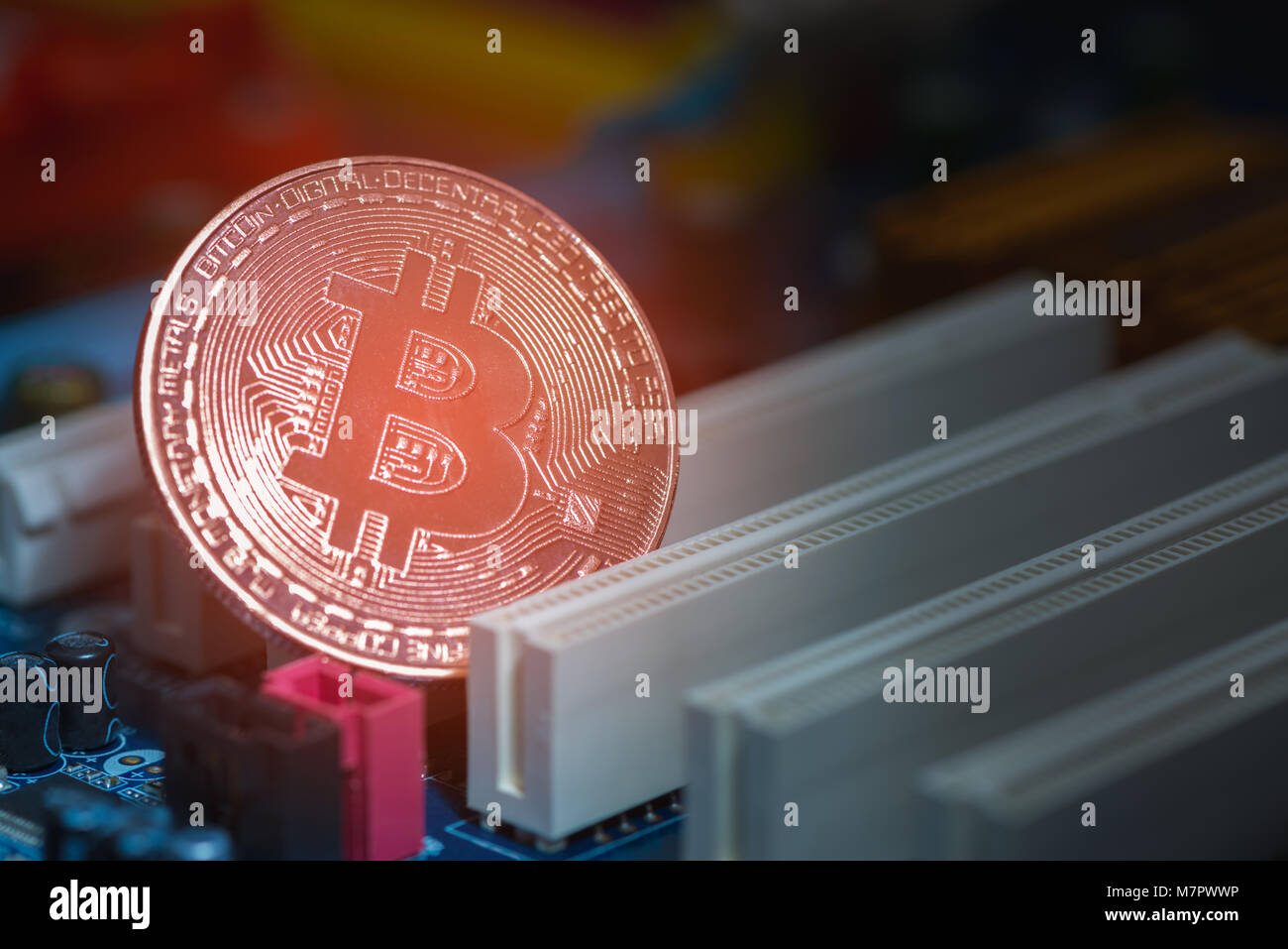 Bitcoin digital currency, bit-coin on motherboard or electronic board ...