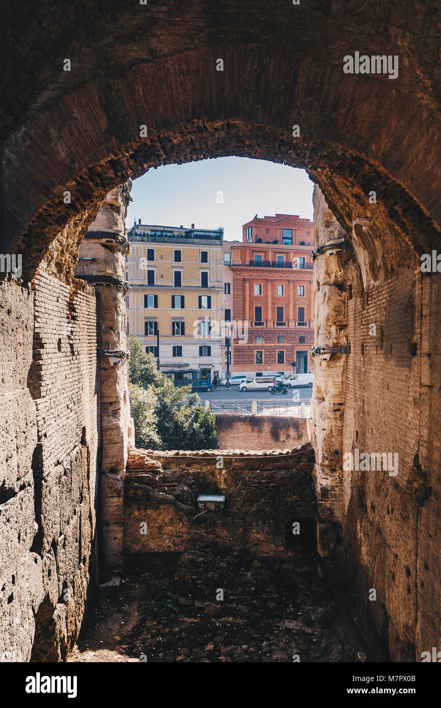 Archway in Colosseum with Rome city streets visible Stock Photo - Alamy