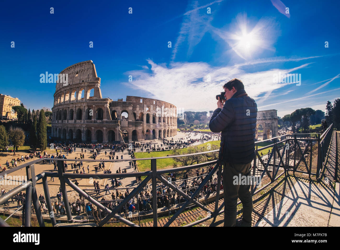 Tourist taking pictures at the Colosseum in Rome, Italy Stock Photo - Alamy