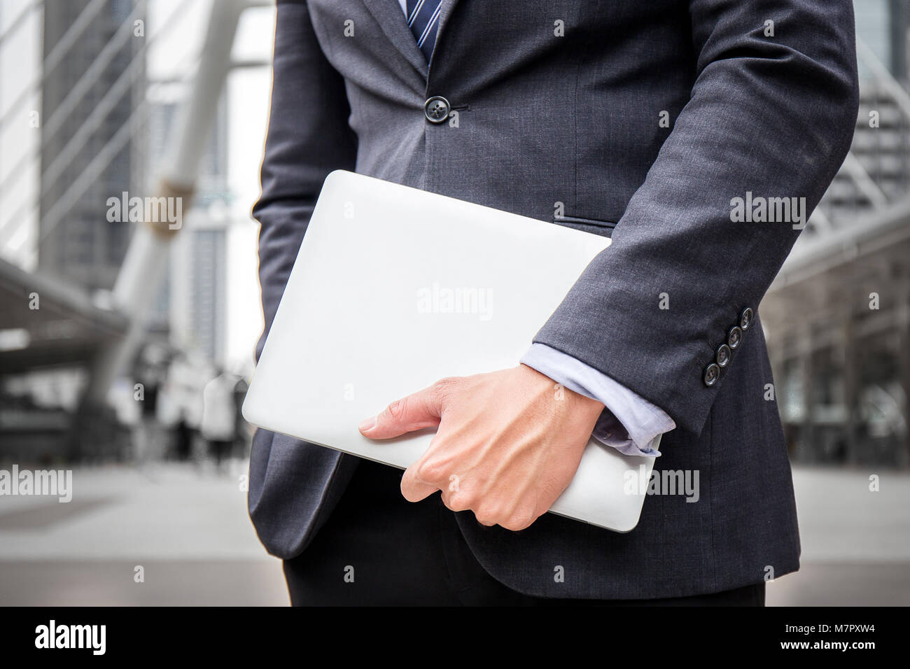 Smart businessman wear suit hold laptop, computer, to office for his ...