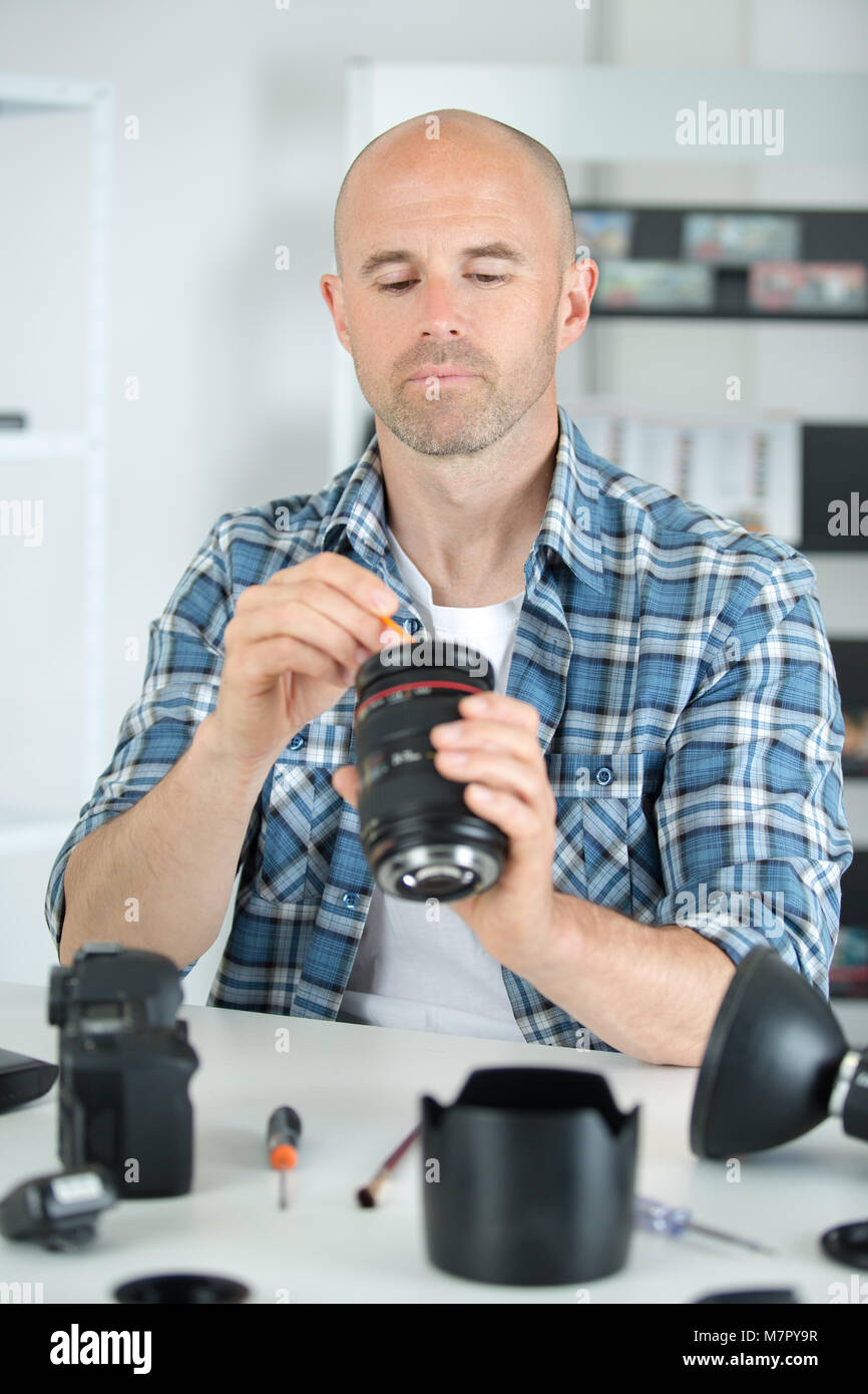 technician fixing camera Stock Photo - Alamy