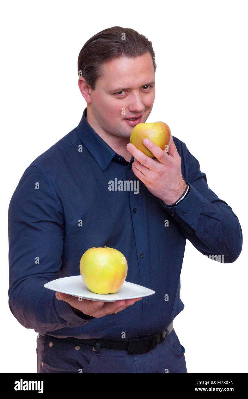 Portrait of young athletic elegant man with blue shirt offering one ...