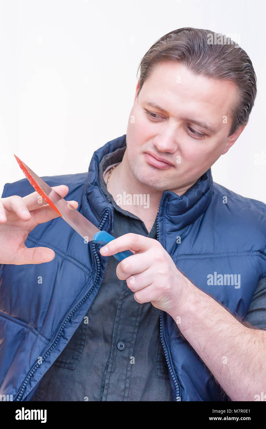 Man holding knife anger hi-res stock photography and images - Alamy