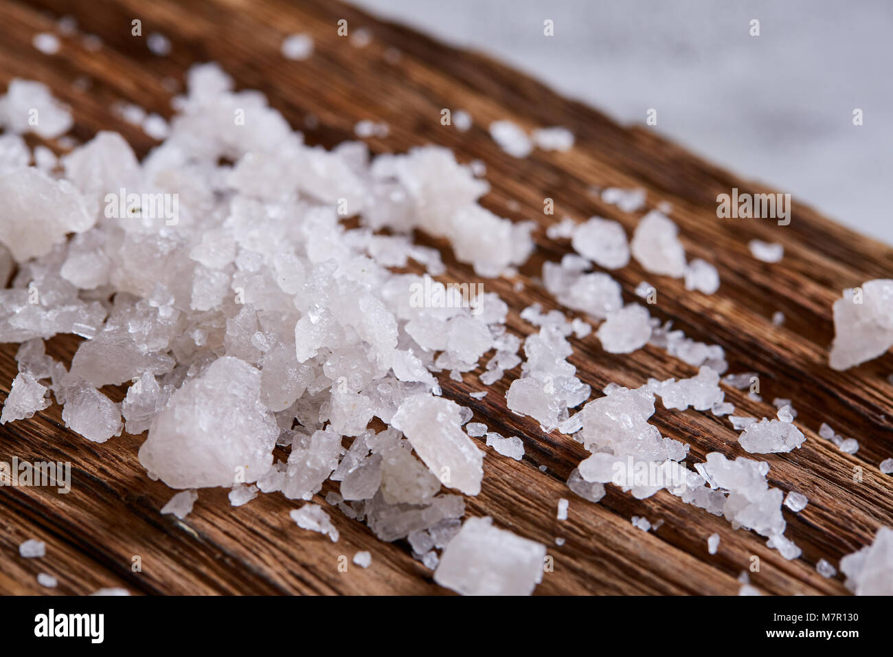 Pile of salt crystals on the vintage background, top view, flat lay ...