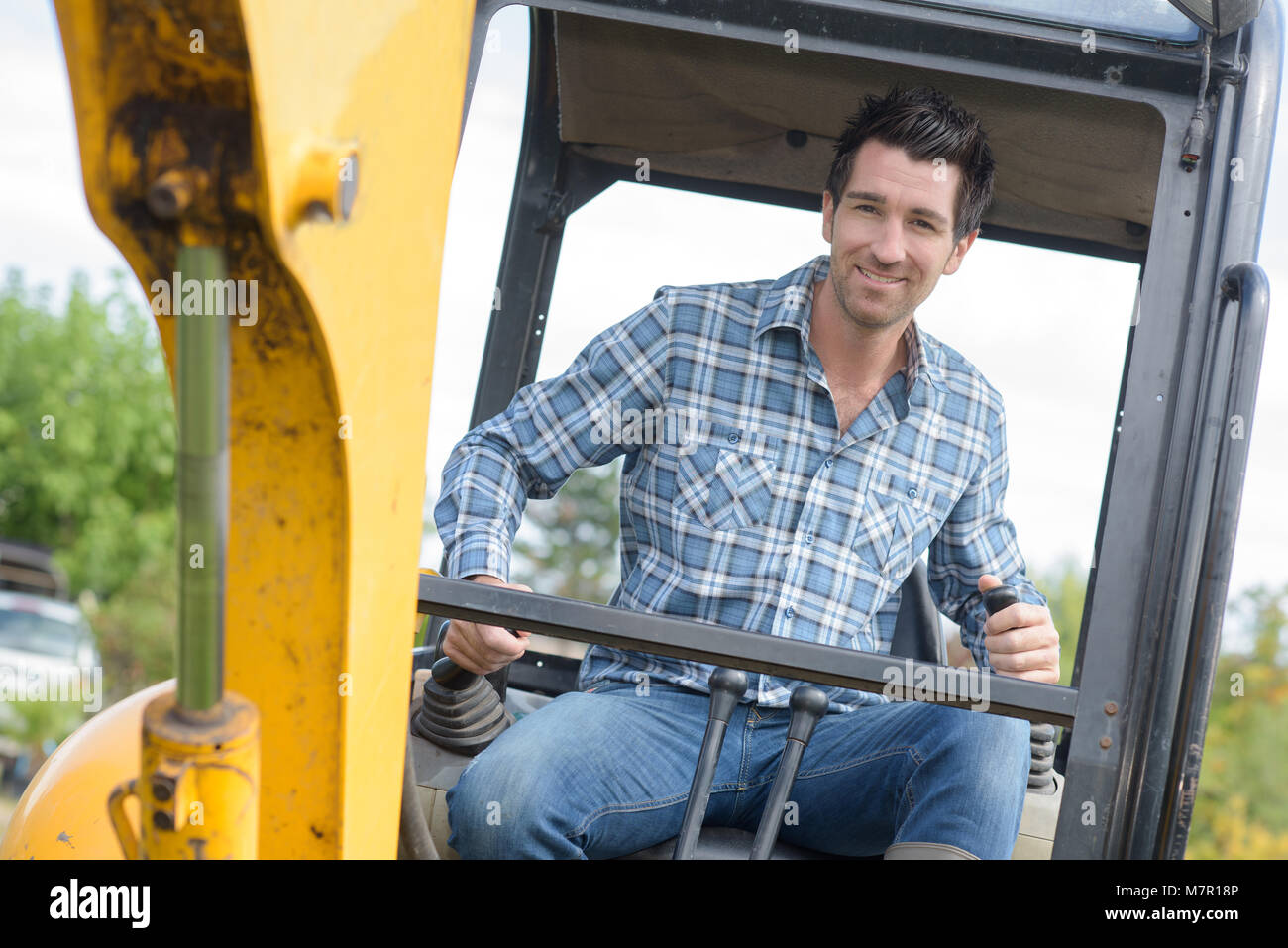 Portrait of man in digger Stock Photo - Alamy