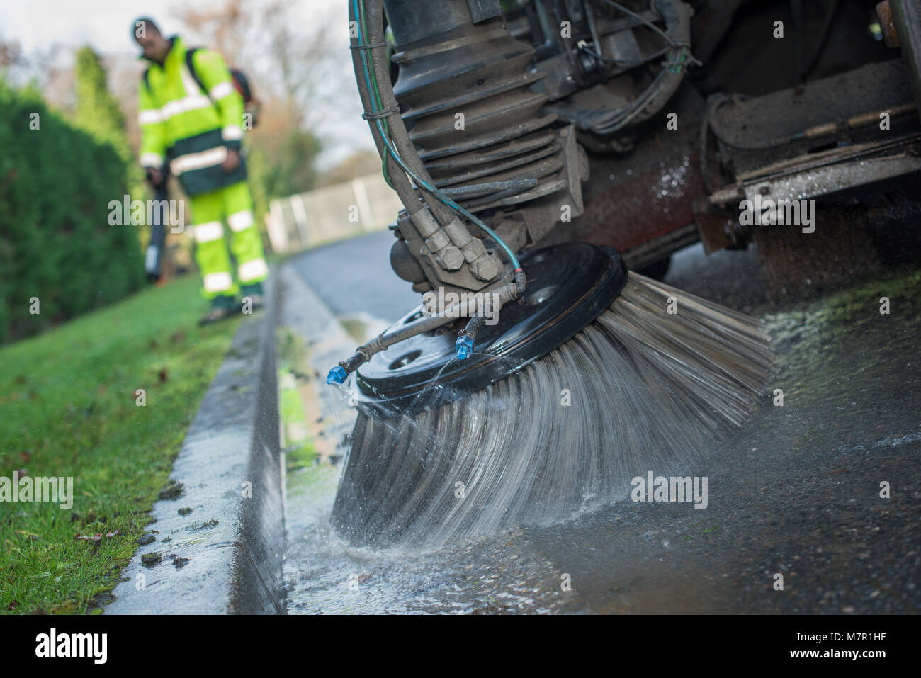 street cleaner vehicle on the road Stock Photo - Alamy