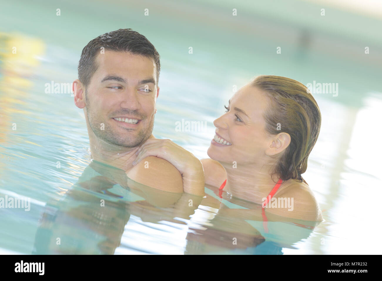 couple in the swimming pool Stock Photo - Alamy