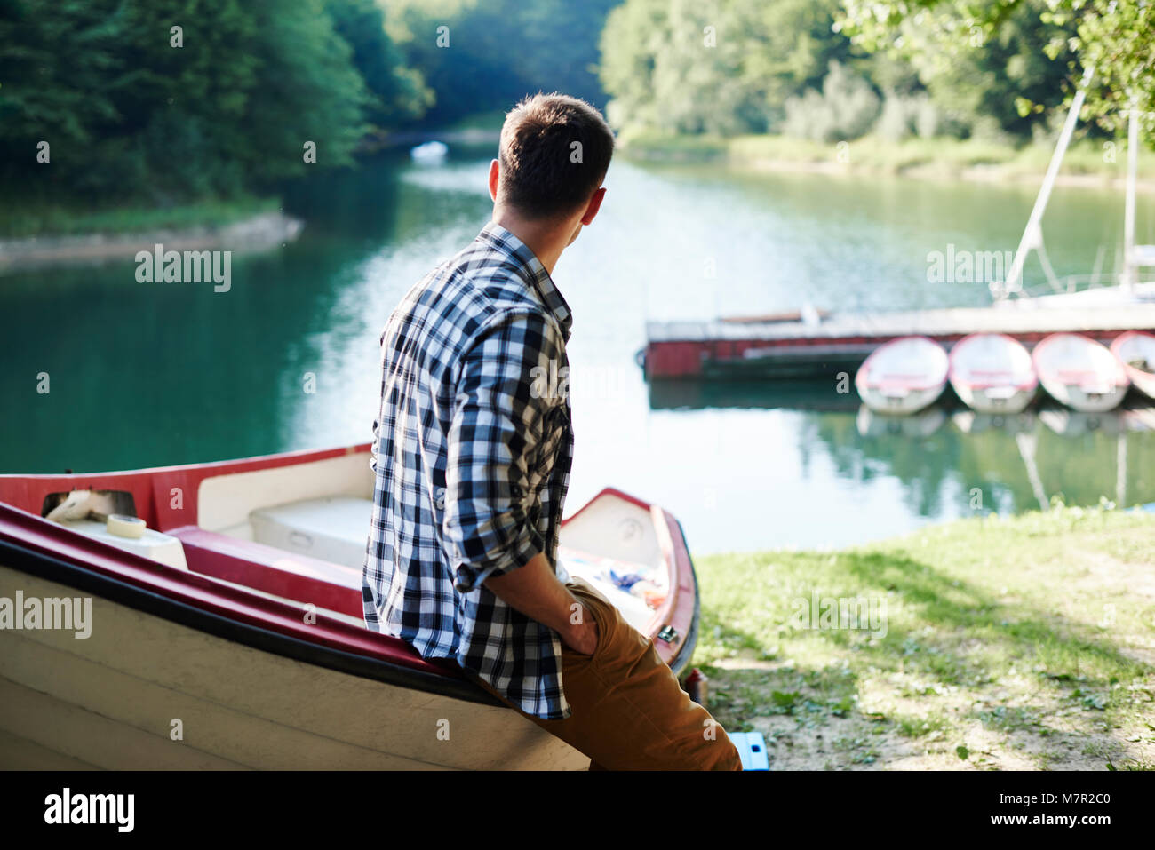 Person looking at lake fish hi-res stock photography and images - Alamy