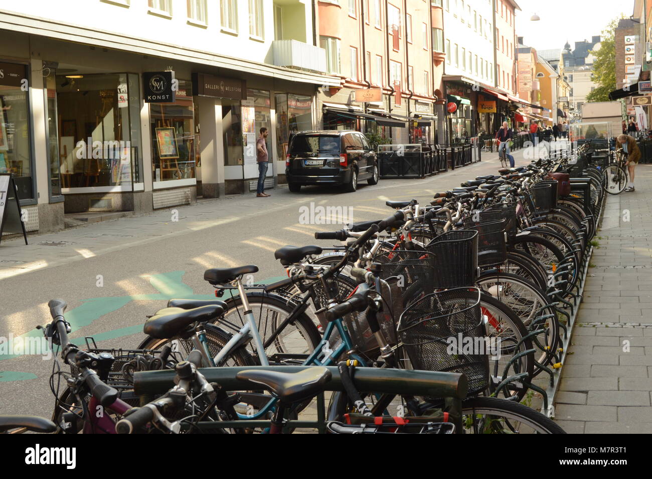 A lot of bikes standing in the street Stock Photo - Alamy