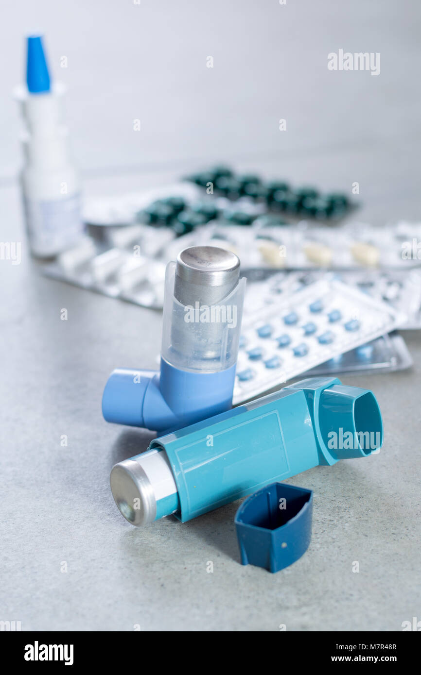 Pills and inhalers for asthma, bronchitis, lungs diseases, first aid ...