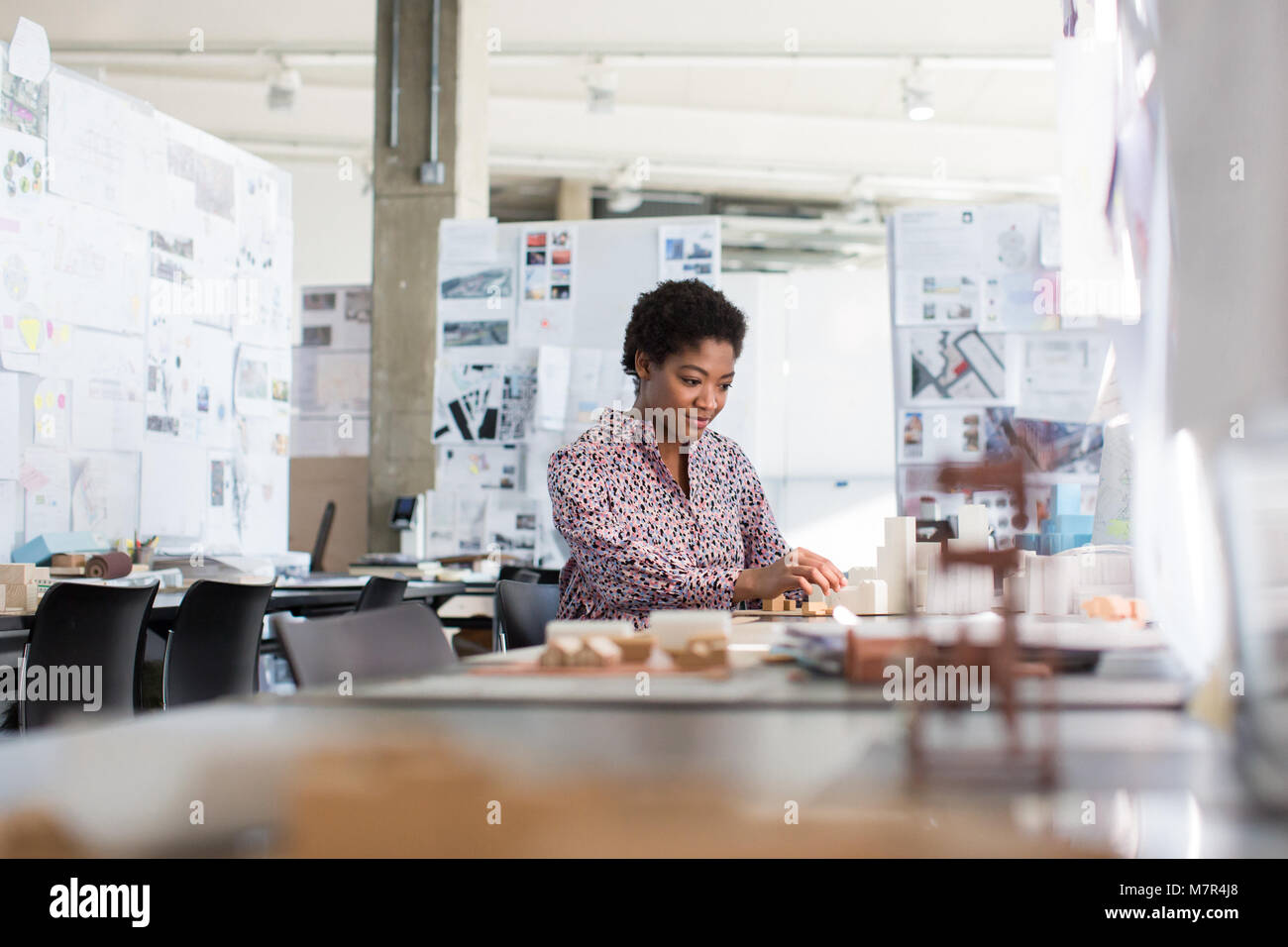 Architect working on scale model Stock Photo - Alamy