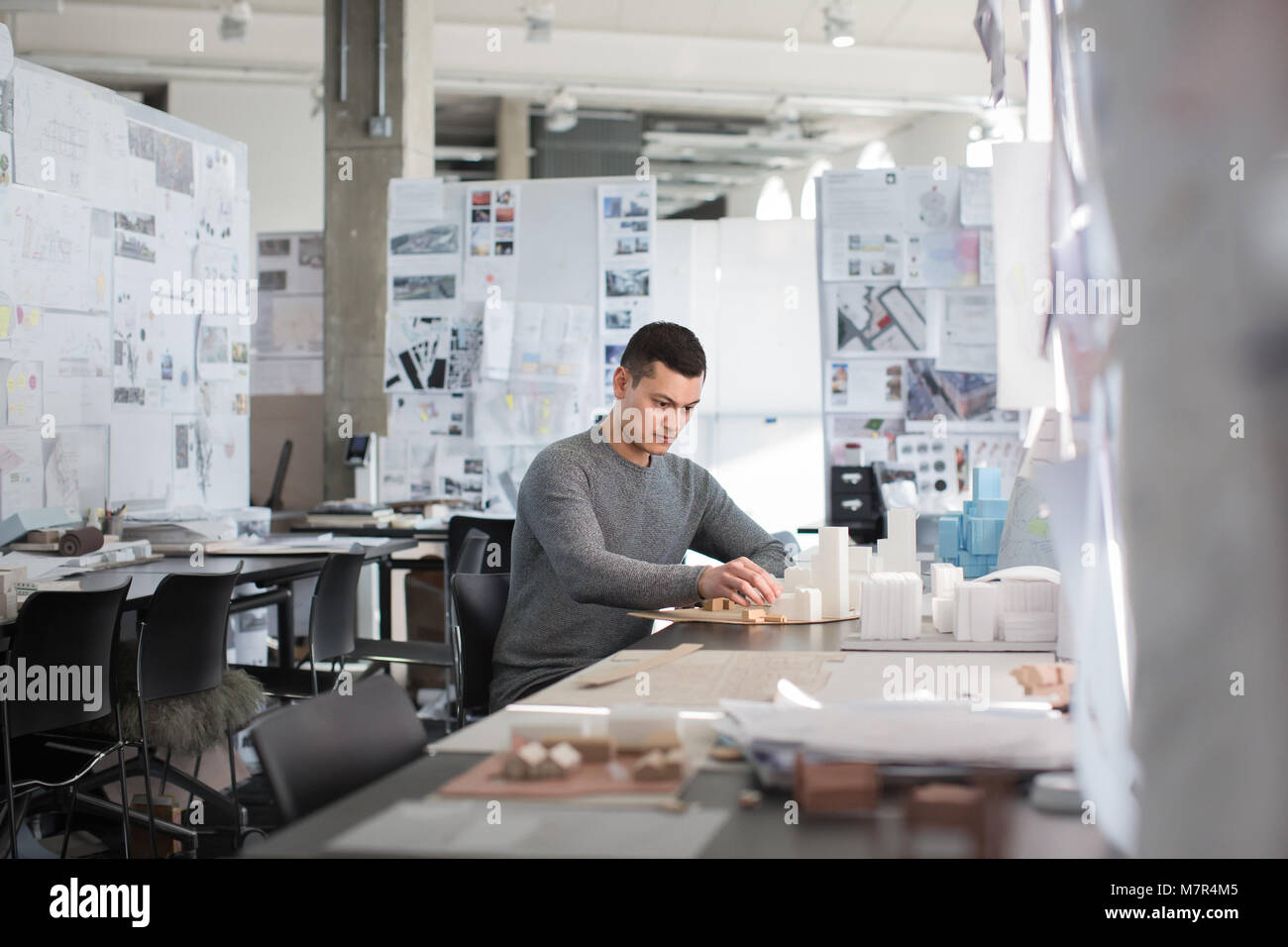 Architect working on scale model Stock Photo - Alamy