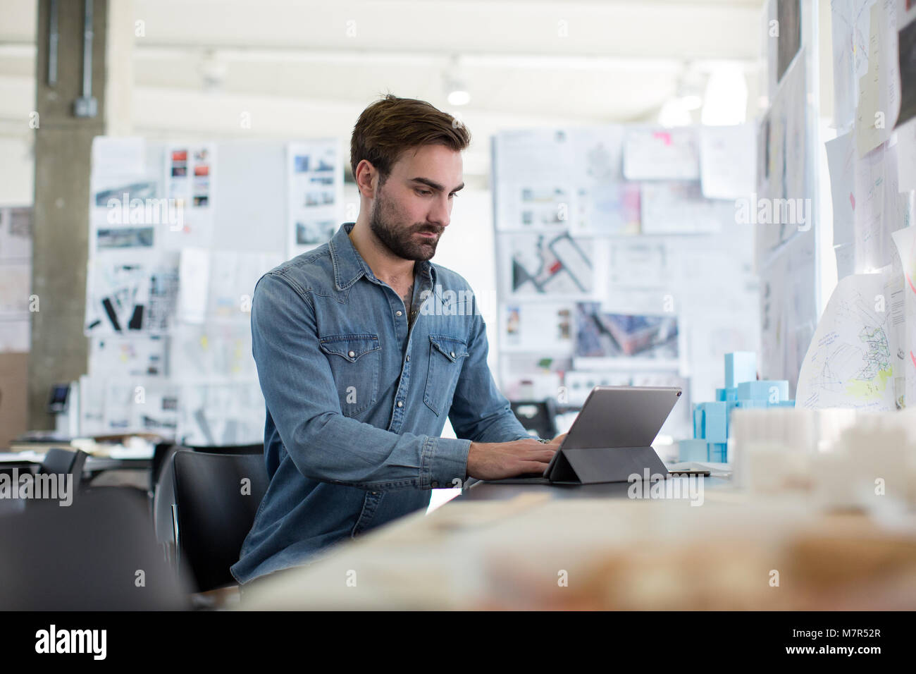 Young creative businessman typing hi-res stock photography and images ...