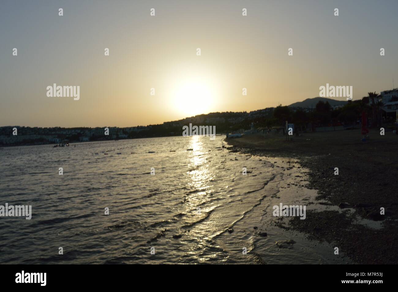 Sunset beaches natural lighting hi-res stock photography and images - Alamy