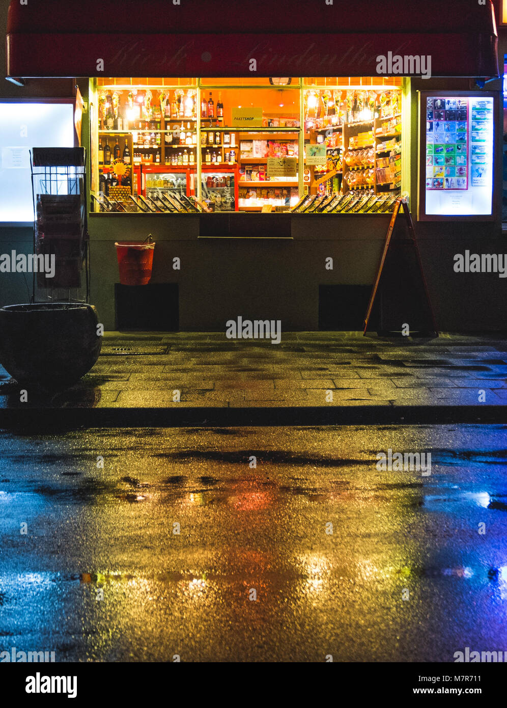 Front of a street shop at night Stock Photo - Alamy
