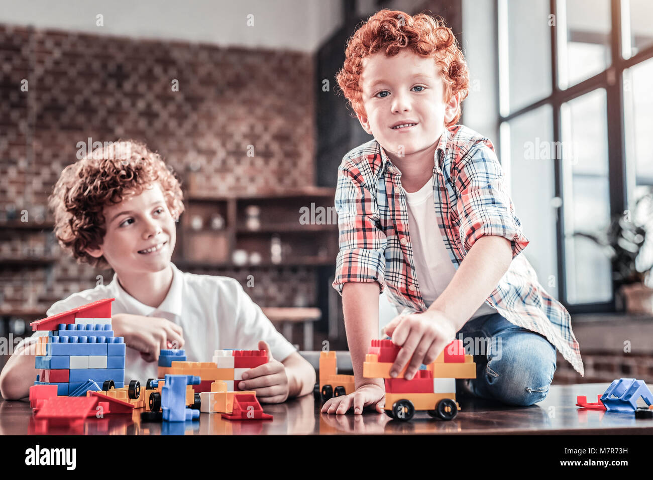 Happy positive boys having fun Stock Photo - Alamy