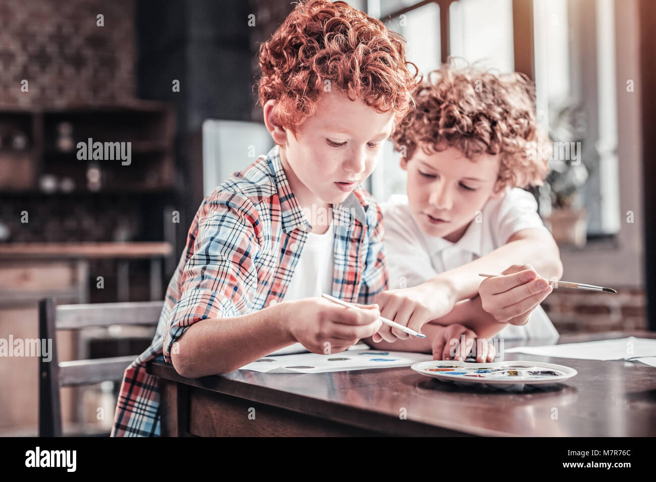Delighted cute boys expressing their creativity Stock Photo - Alamy