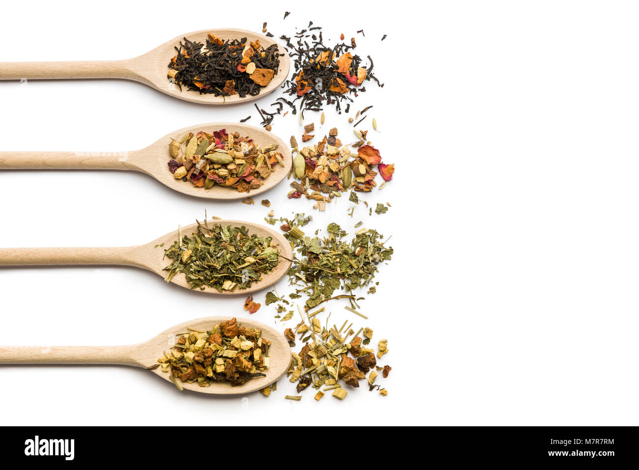 variety of tea blend on wooden spoon on white background Stock Photo ...