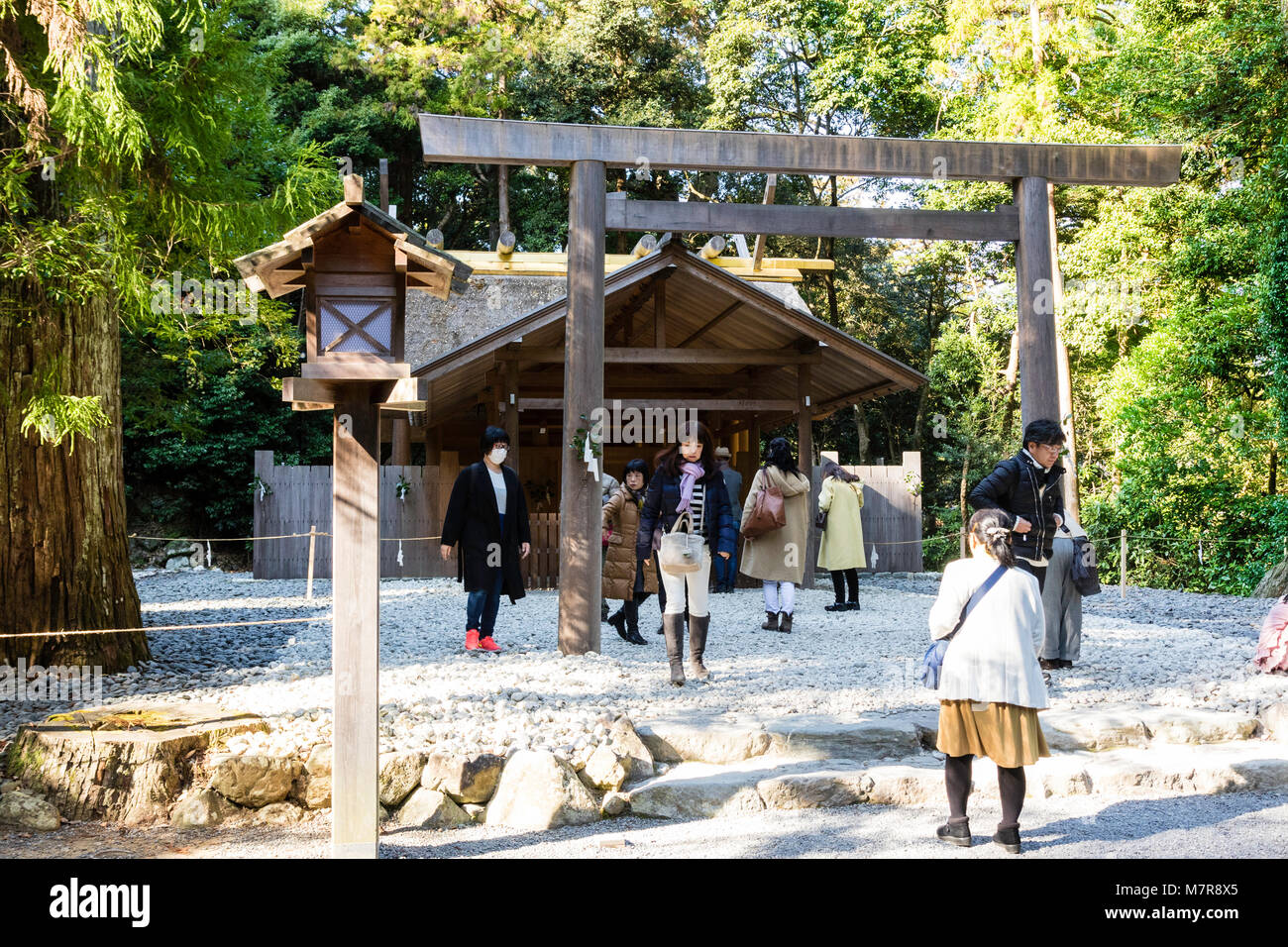 Japan, Ise, Ise-jingu Geku, Outer Shrine. People praying at small ...