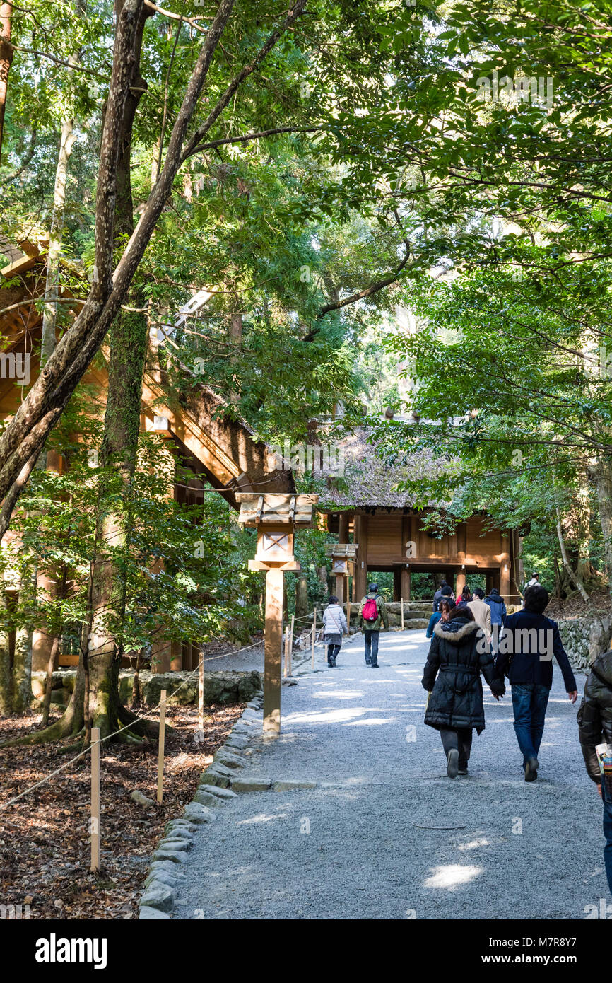 Japan, Ise Grand Shrine, Naiko, inner shrine. People walking along path ...