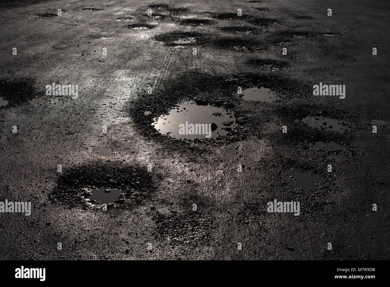 Pothole full of water hi-res stock photography and images - Alamy