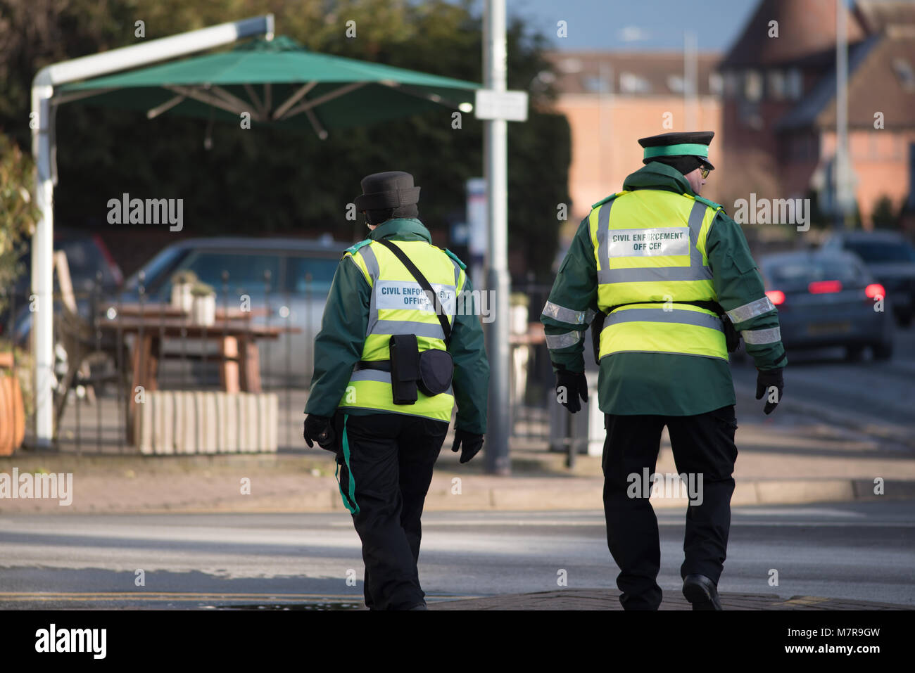civil enforcement traffic wardens walking down street together Stock ...
