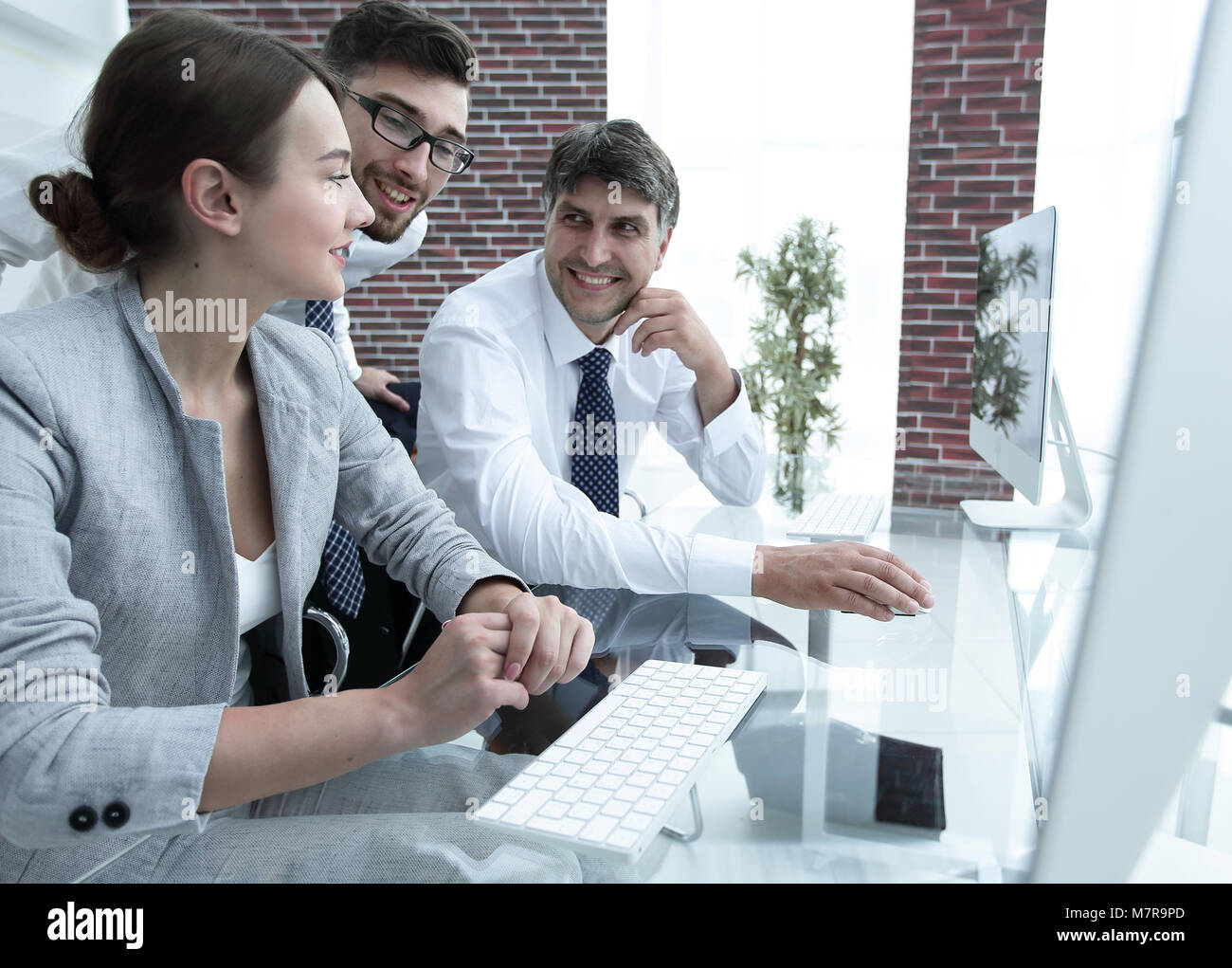 business team working in a computer room Stock Photo - Alamy