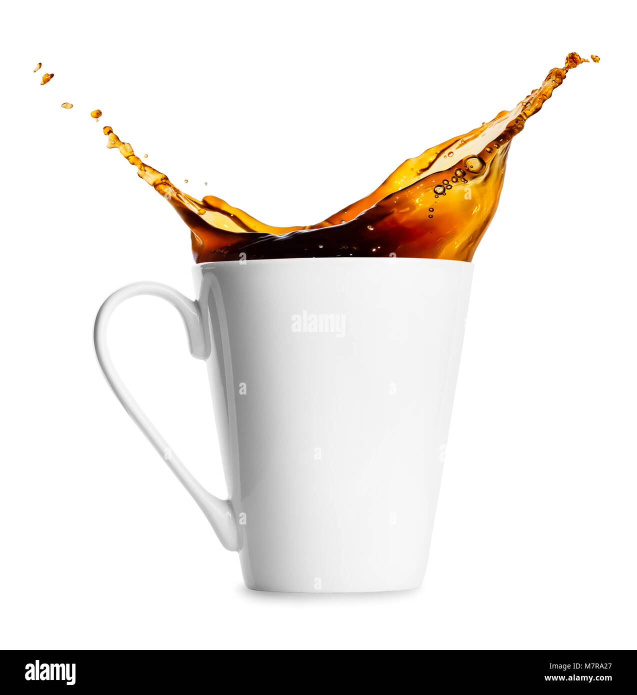 mug of spilling coffee or tea isolated on white background. Coffee ...