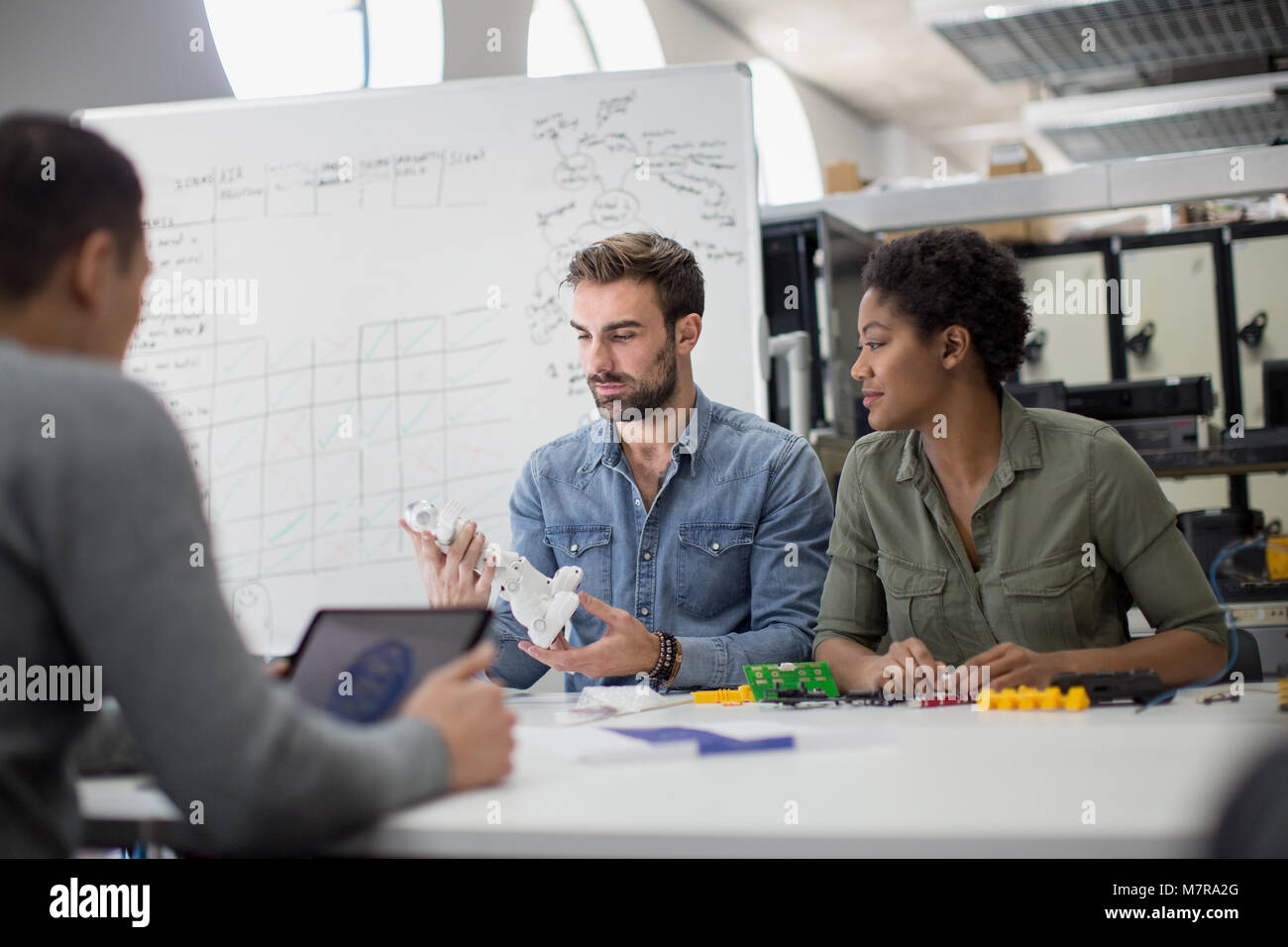 Team working on robotics project Stock Photo - Alamy