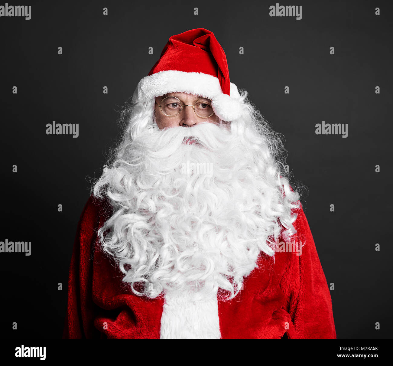 Portrait of tired santa claus at studio shot Stock Photo - Alamy