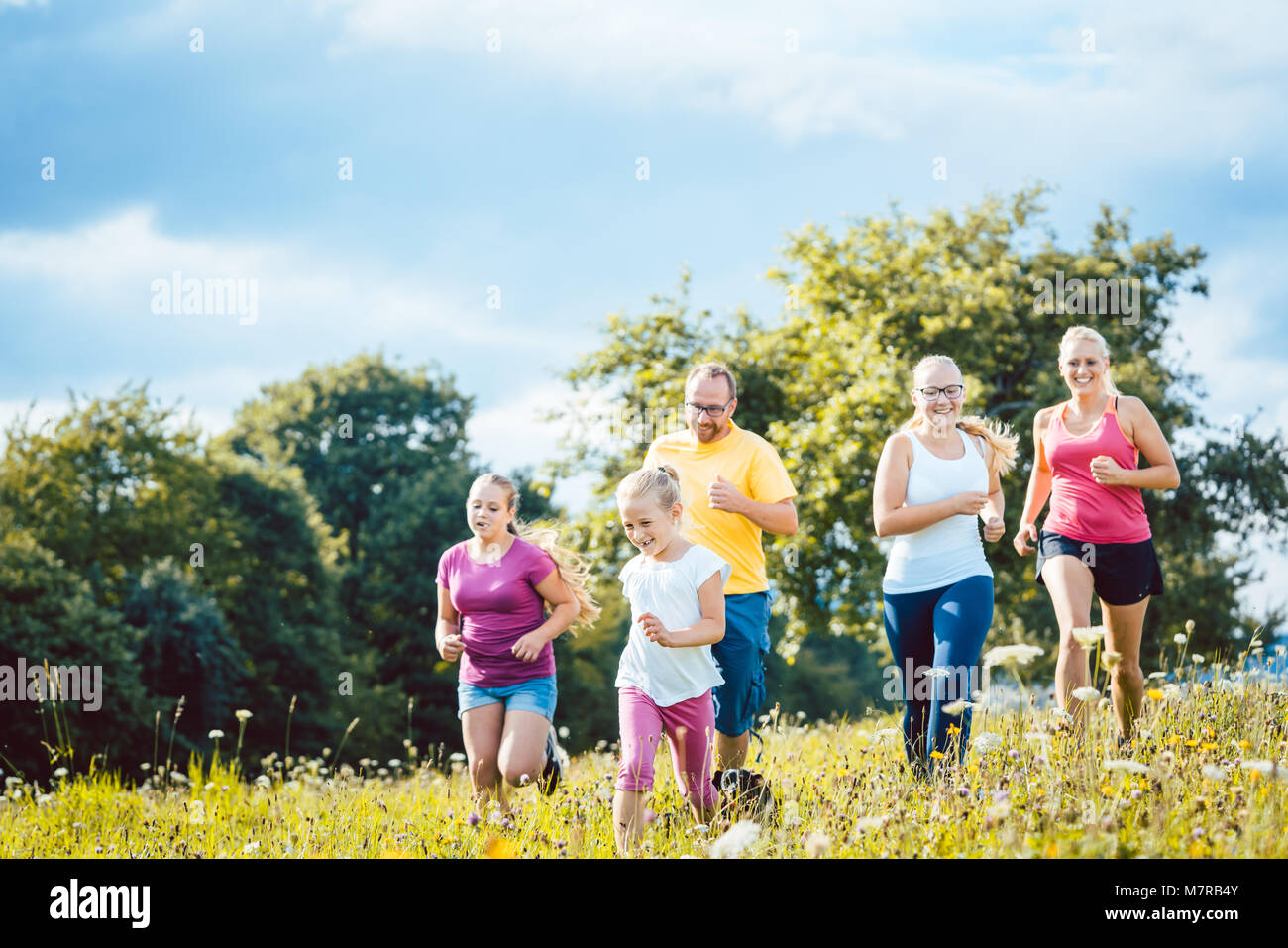 Fitness family running on hi-res stock photography and images - Alamy