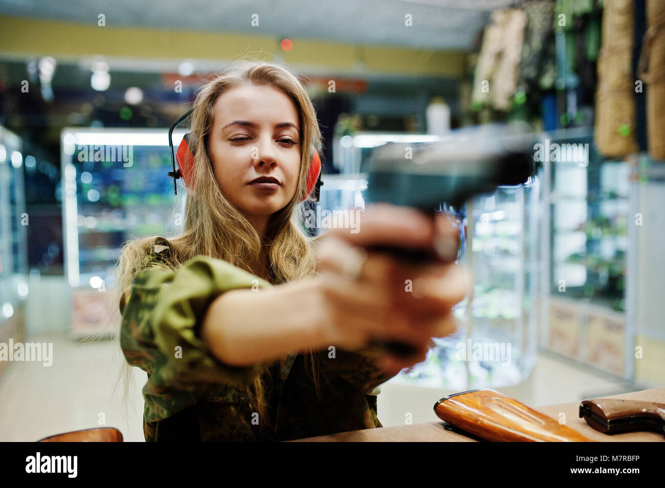 Woman shooting range hi-res stock photography and images - Alamy