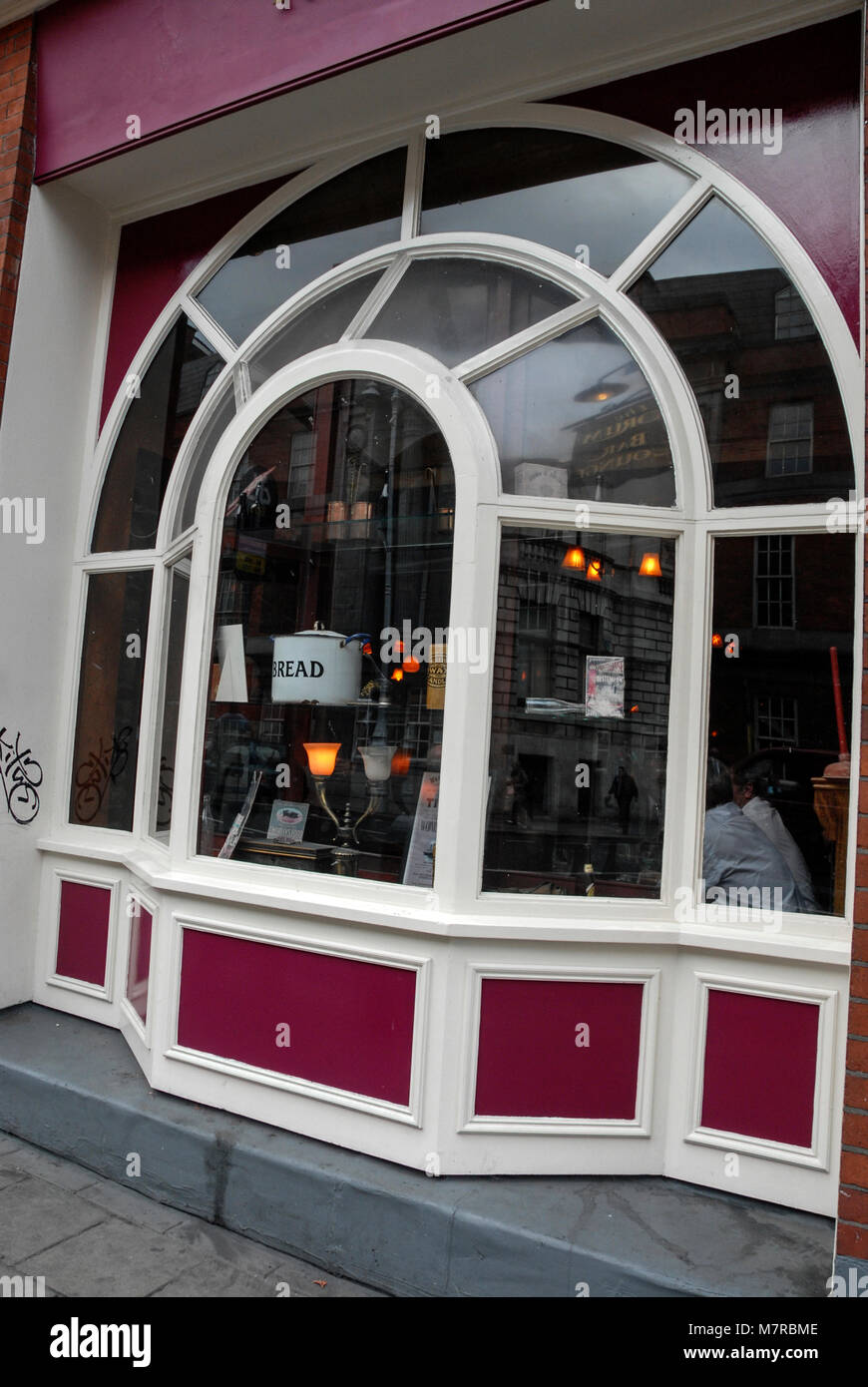 A pub window display of old items in Dublin, Southern Ireland Stock ...