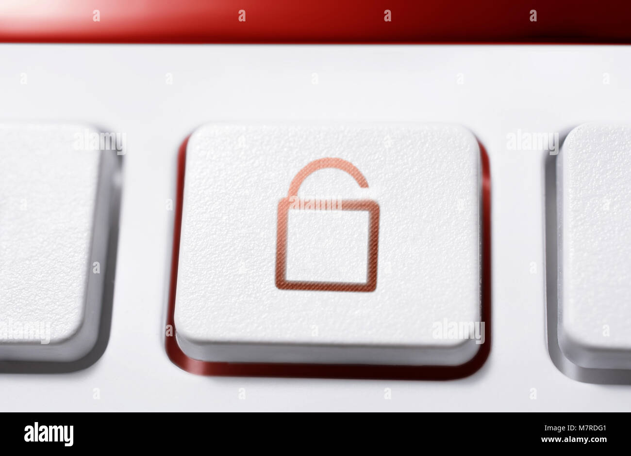 Macro Of A White Button With Red Opened Security Lock Icon Stock Photo ...