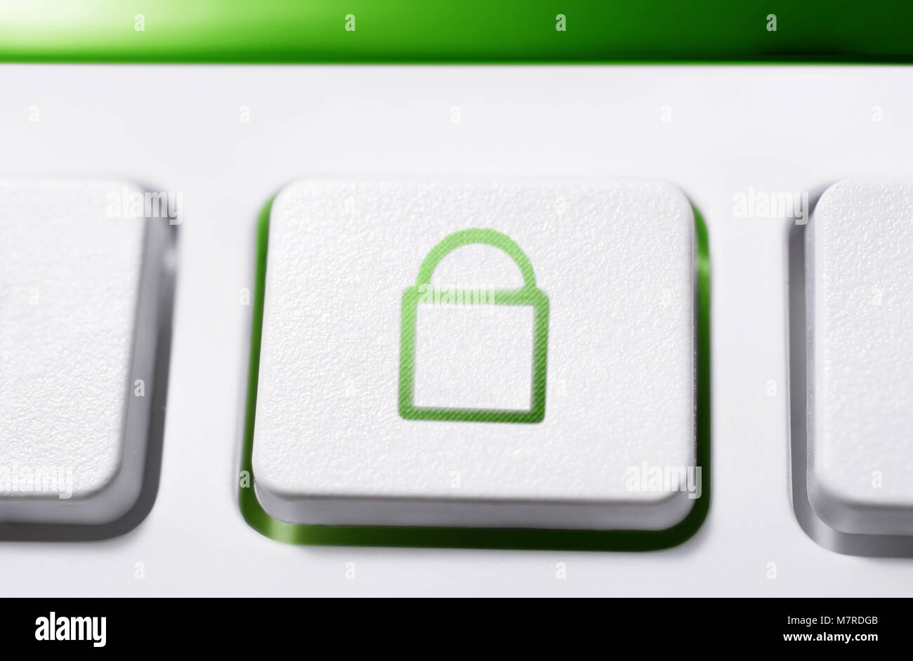 Macro Of A White Button With Green Closed Security Lock Icon Stock ...