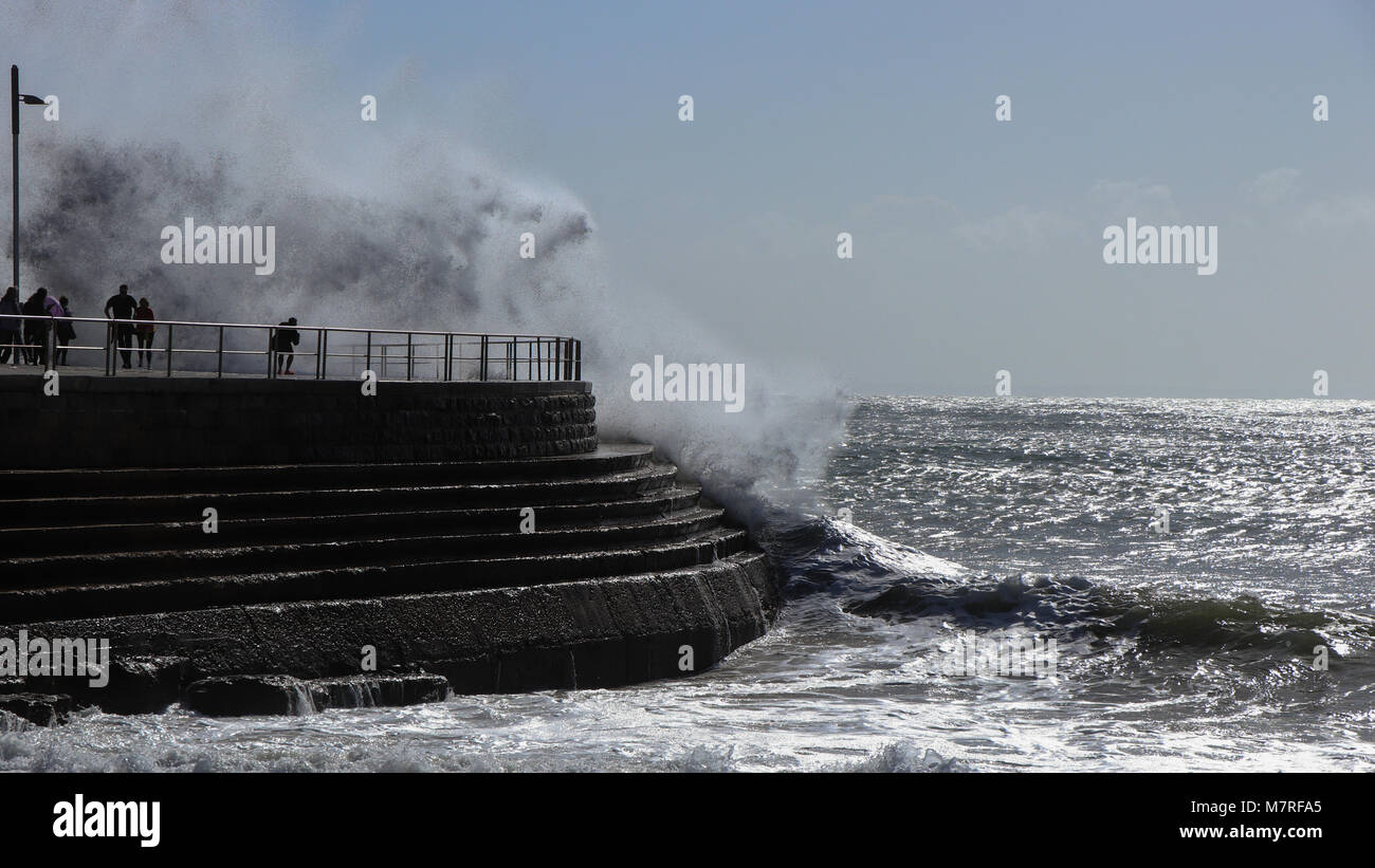 Big storm waves reach a breakwater structure in a pier in the Atlantic ...