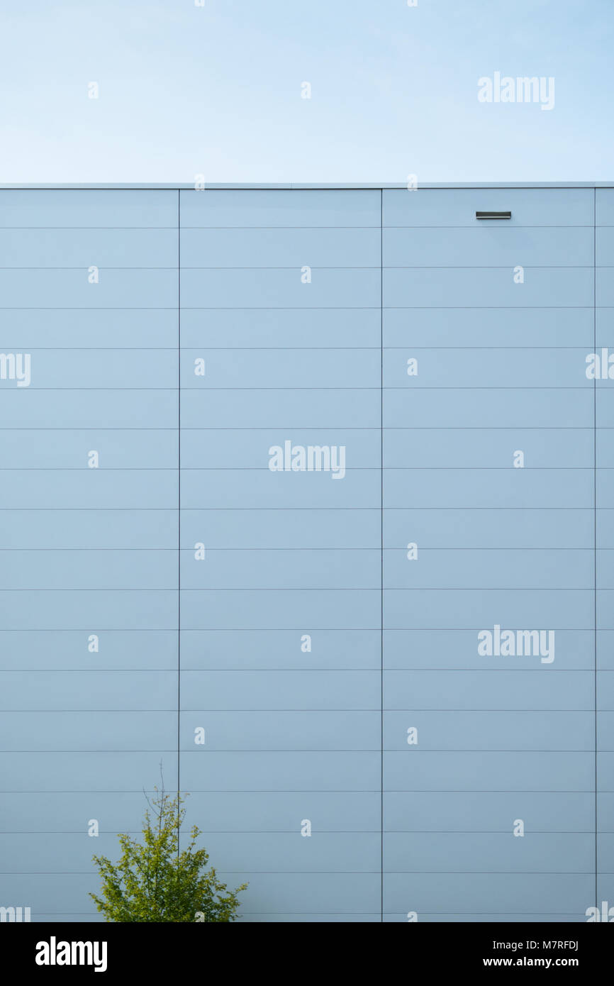 Details of gray facade made of aluminum panels on industrial building ...