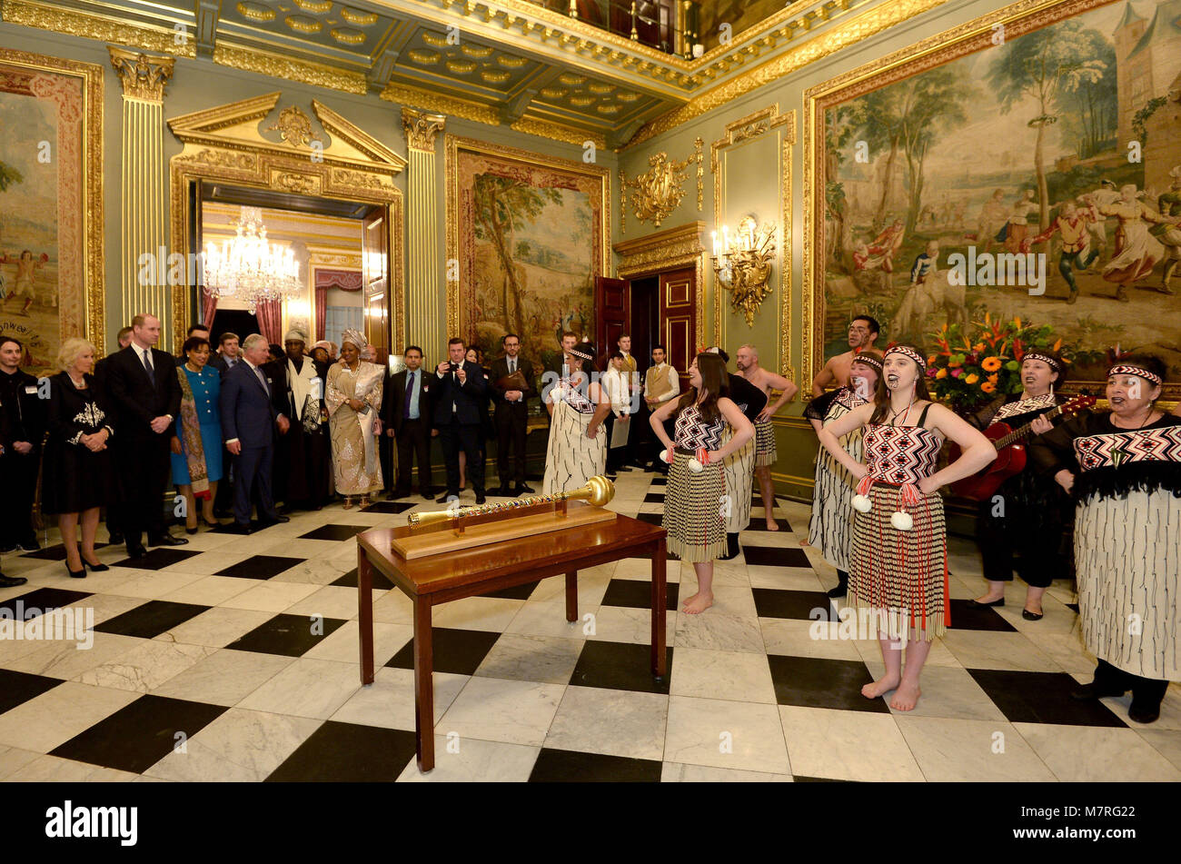 Guests enjoy a performance at a reception held at Marlborough House ...