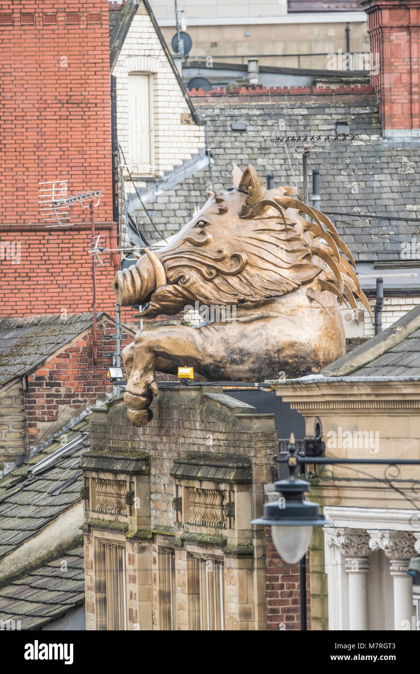 Ivegate, Bradford, with a giant statue of a boar on top of the old ...