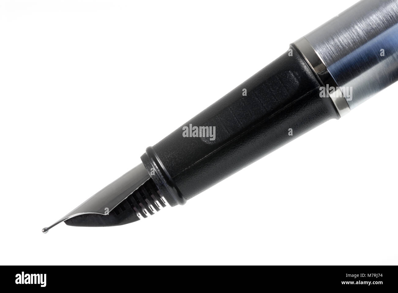 Black executive stainless steel fountain pen in macro or close-up ...