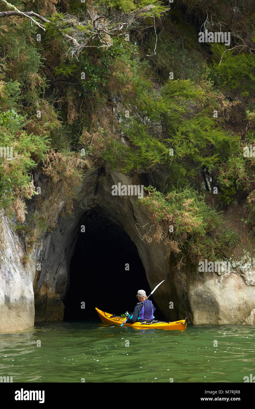 Kayak and sea cave, Stilwell Bay, Abel Tasman National Park, Nelson ...