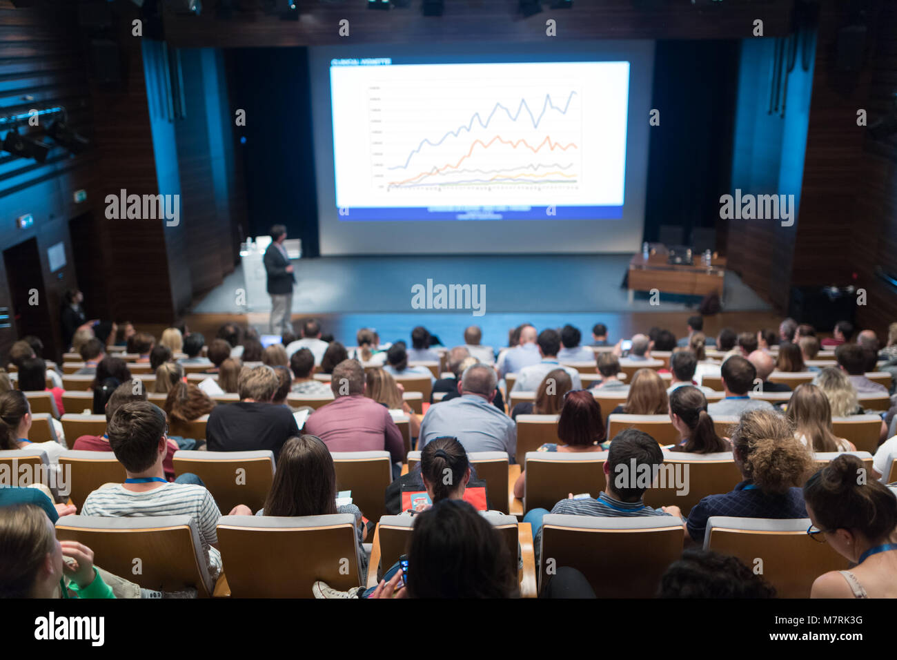 Speaker giving presentation on health care conference Stock Photo - Alamy