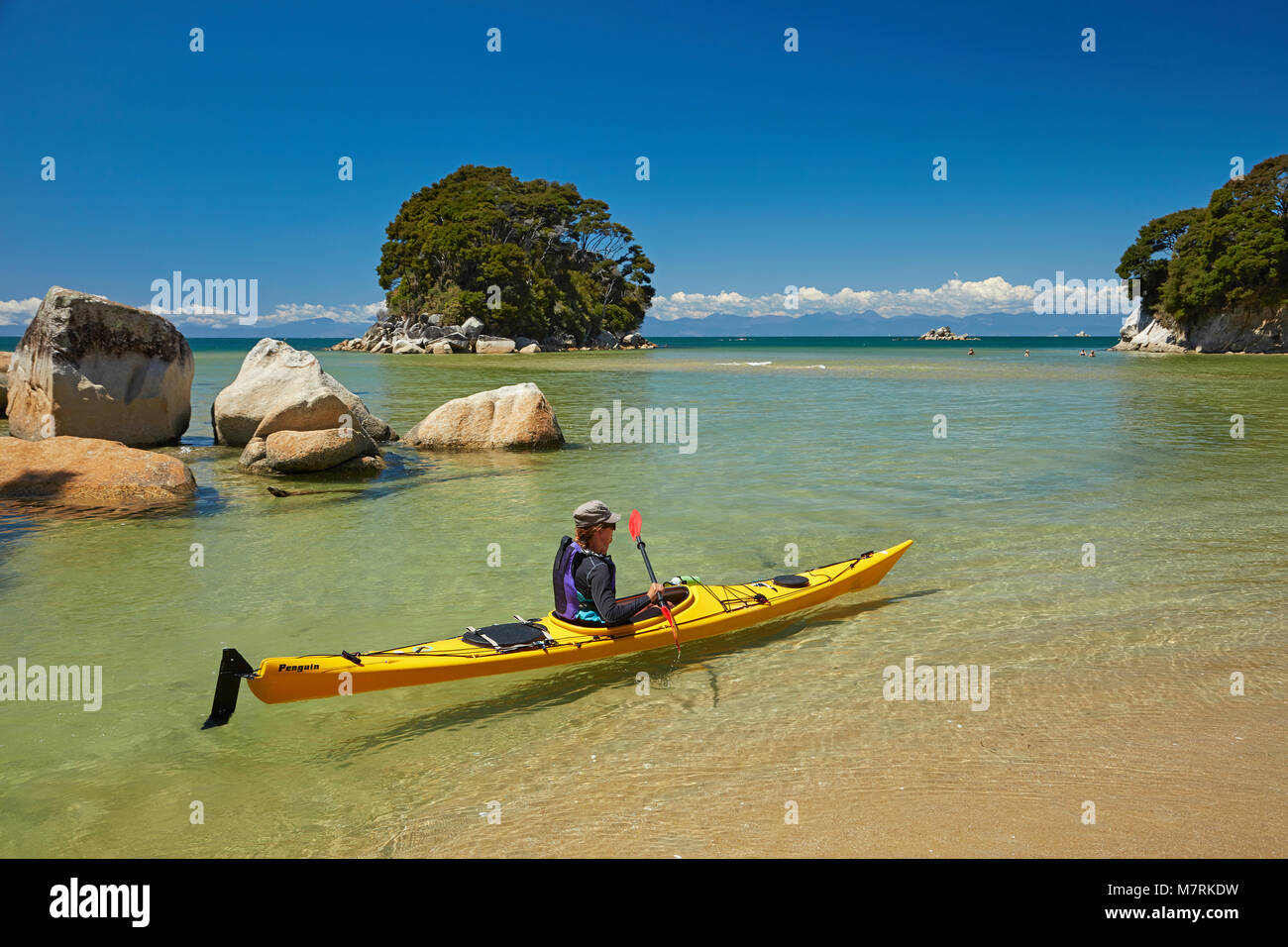 Kayaker, Mosquito Bay, Abel Tasman National Park, Nelson Region, South Island, New Zealand ...