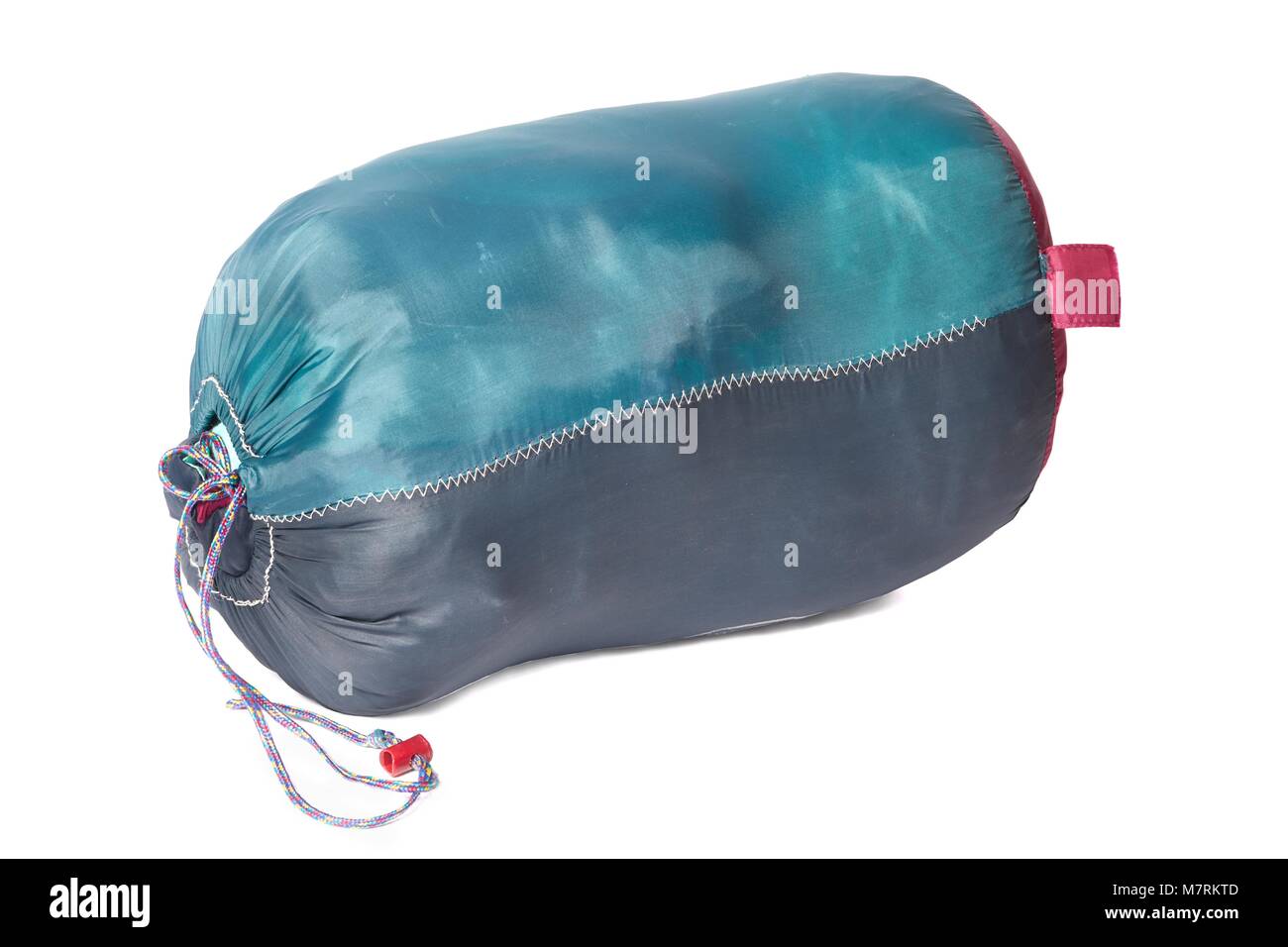 Sleeping bag packed Stock Photo - Alamy
