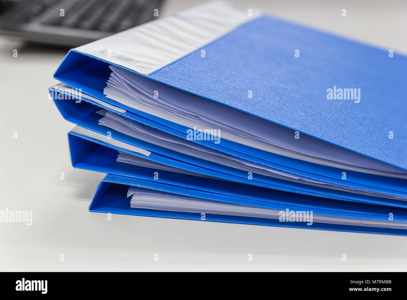 file folder and Stack of business report paper file on desk in office ...
