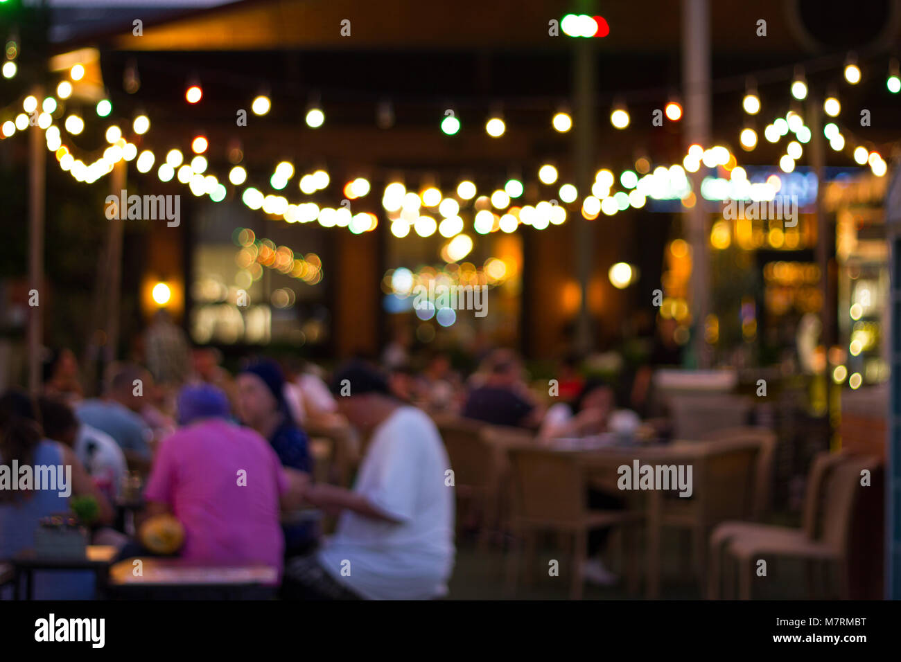 abstract blur image of night festival in a restaurant and The ...