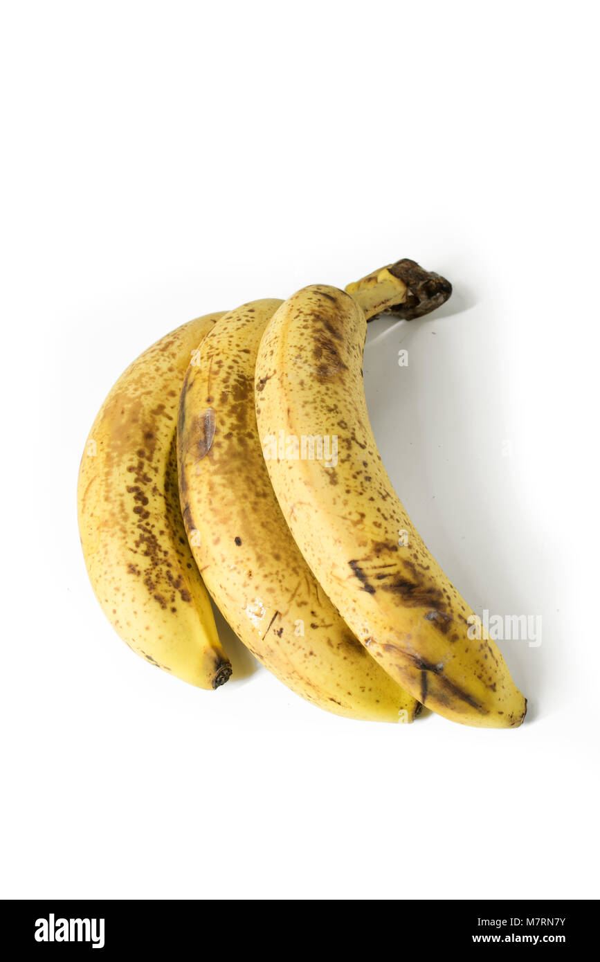 Bunch of three very ripe bananas isolated on white background Stock ...