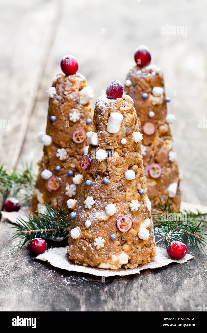 Christmas tree cookies on rustic wooden background Stock Photo - Alamy